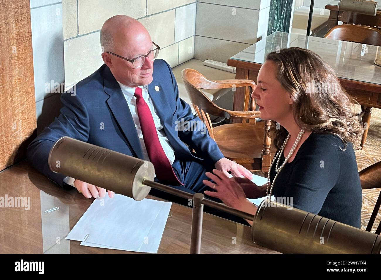 Speaker of the Legislature Sen. John Arch, left, discusses a bill with ...