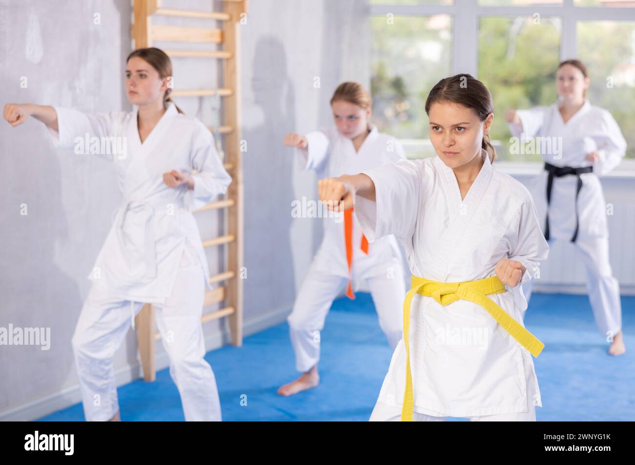 Team of teenage girls in kimonos uses new fighting techniques during ...
