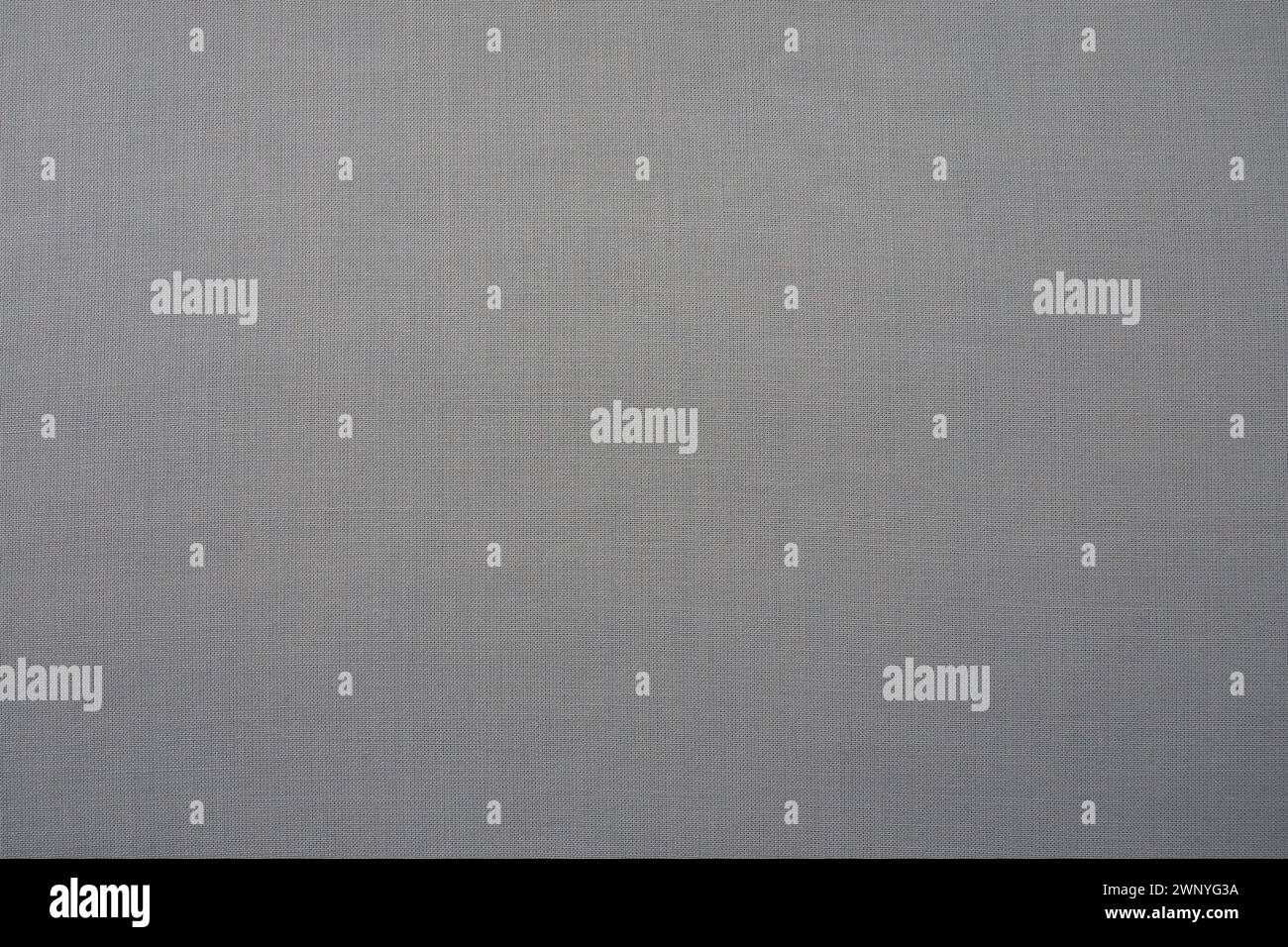 gray background fabric texture. A piece of woolen cloth is neatly laid ...