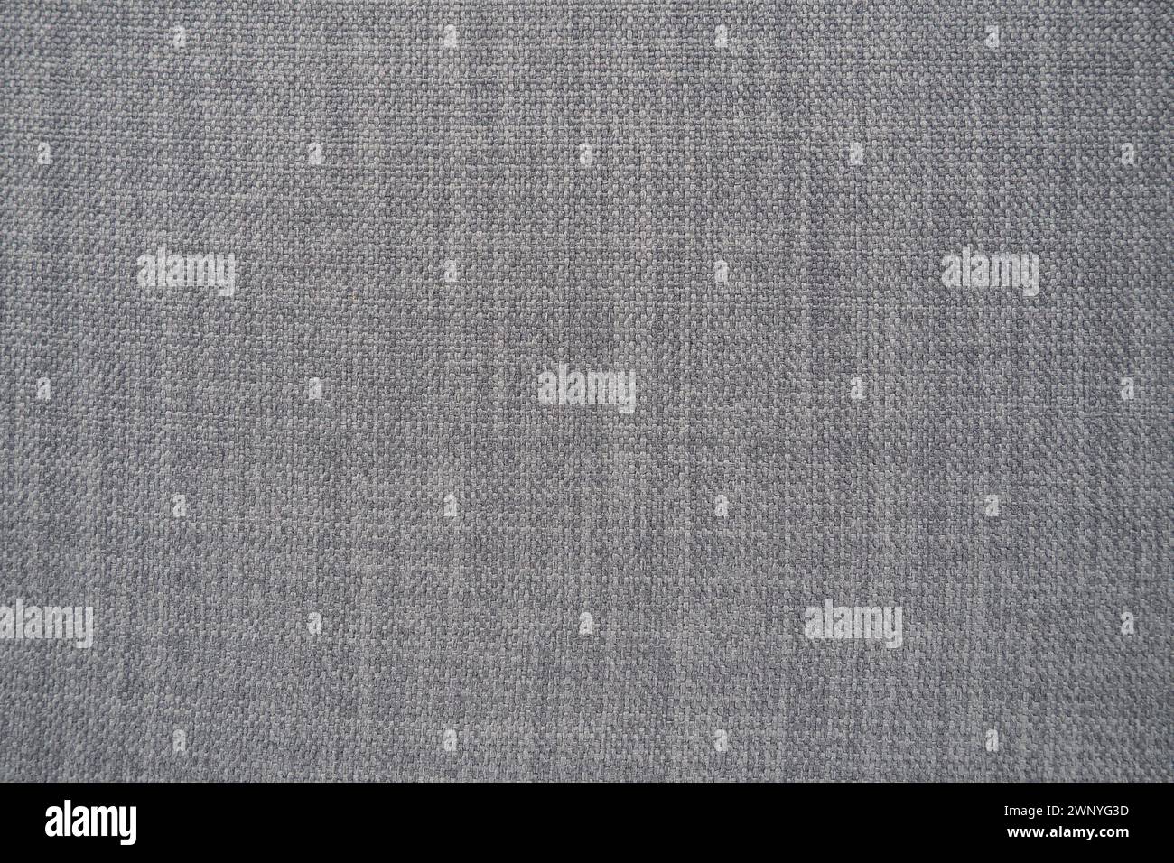 gray background fabric texture. A piece of woolen cloth is neatly laid ...