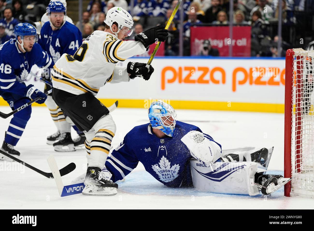 Boston Bruins center Morgan Geekie, front left, celebrates after ...