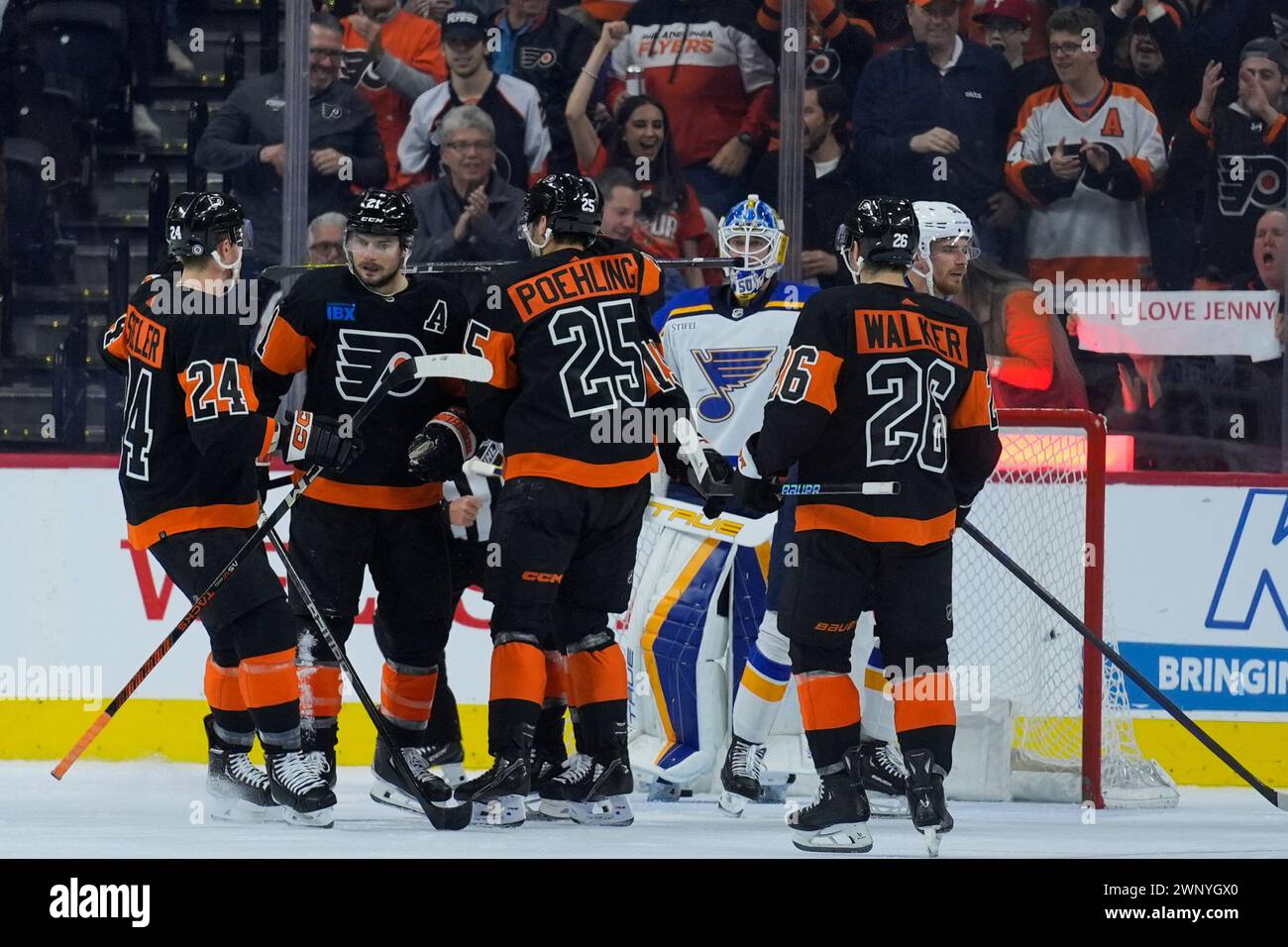 Philadelphia Flyers' Scott Laughton, second left, celebrates a goal ...