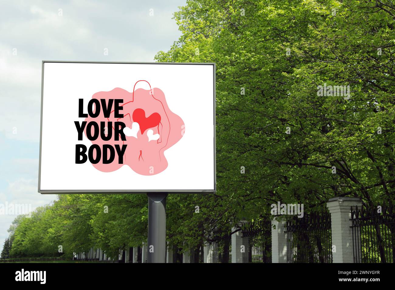 Signboard with outline of woman figure, hearts and phrase Love Your ...