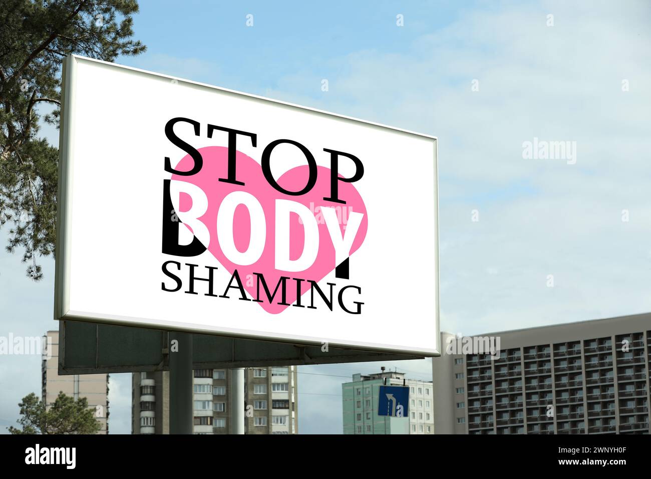 Signboard with phrase Stop Body Shaming and pink heart on city street Stock Photo - Alamy