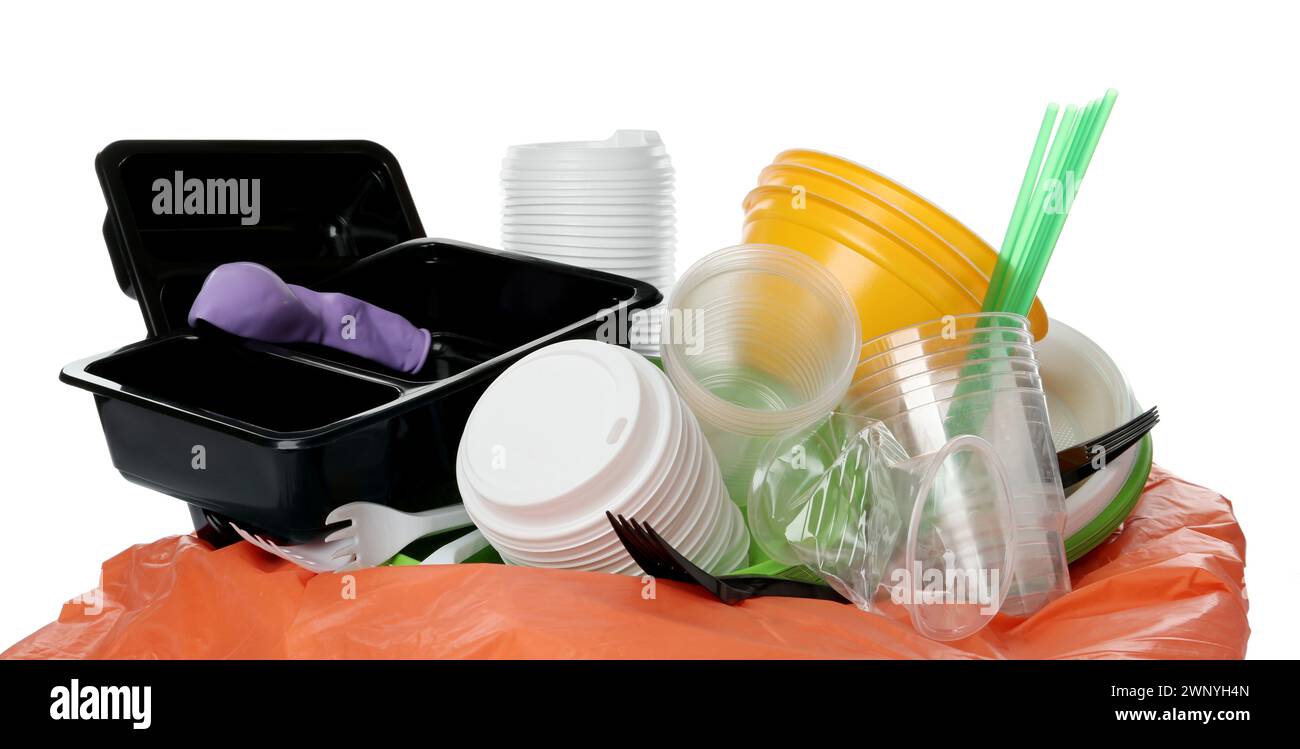 Pile of different plastic items on white background Stock Photo - Alamy