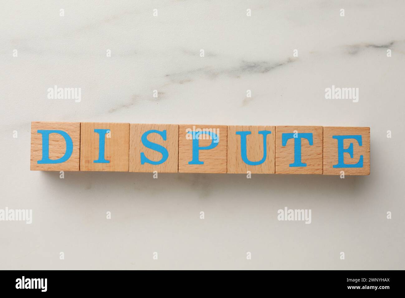 Cubes with word Dispute on white marble table, top view Stock Photo - Alamy