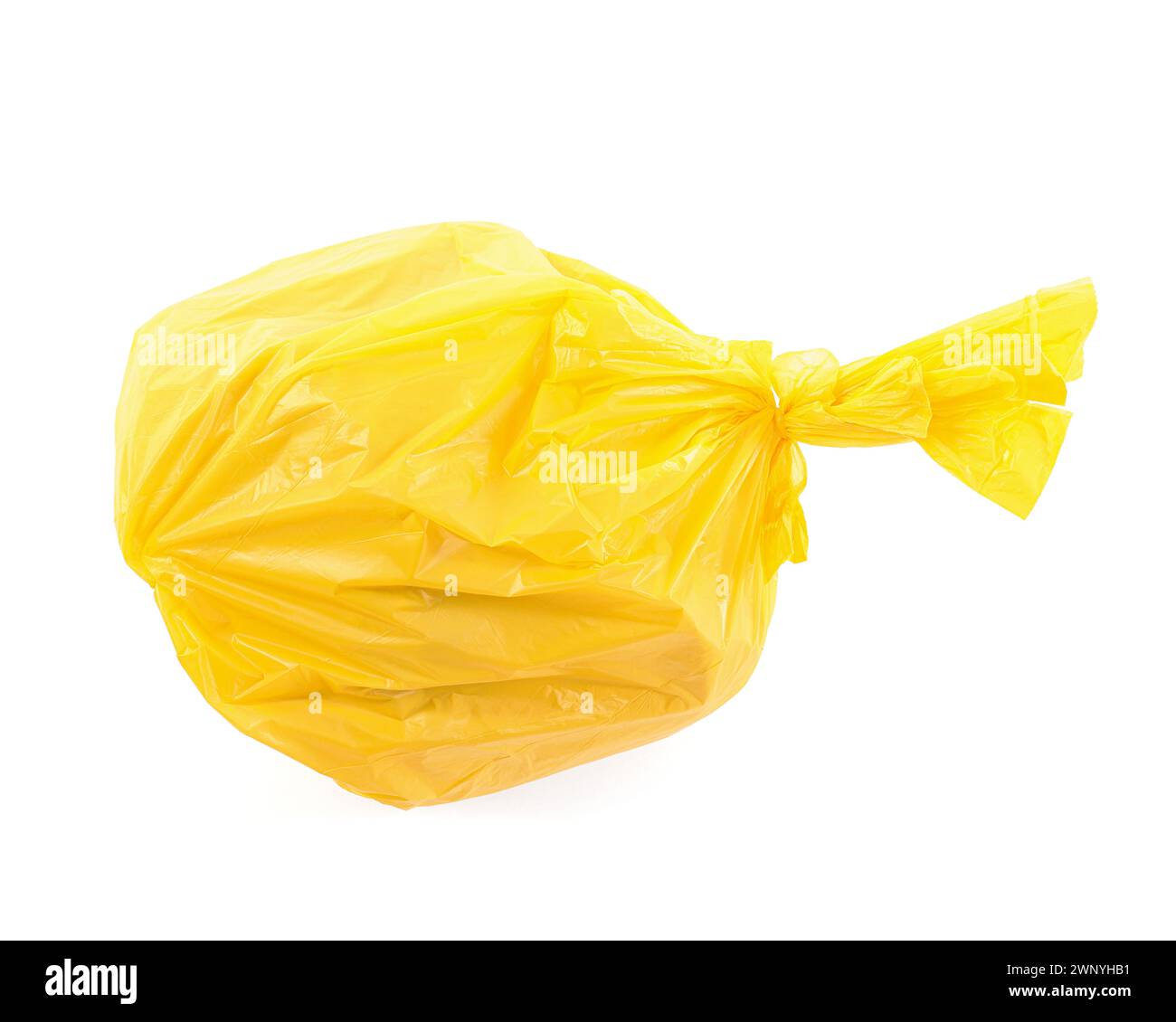 Yellow plastic garbage bag isolated on white Stock Photo - Alamy
