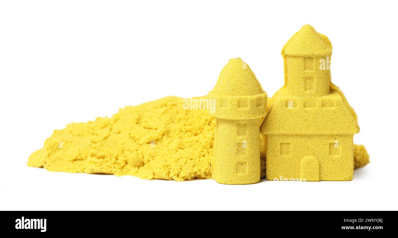 Castle and tower made of yellow kinetic sand isolated on white Stock ...
