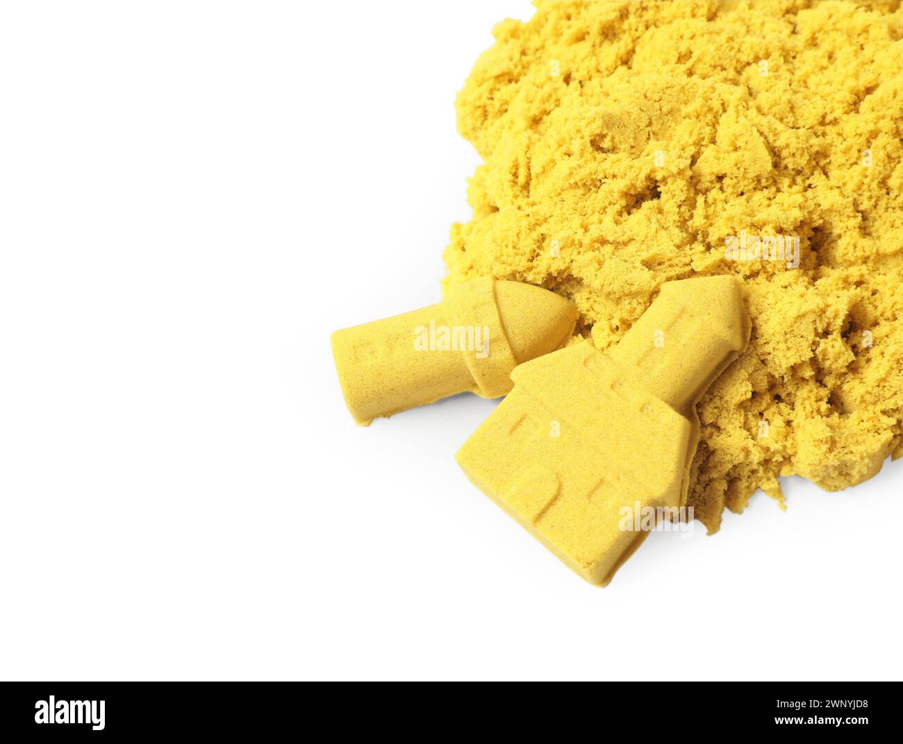 Castle and tower made of yellow kinetic sand isolated on white Stock ...