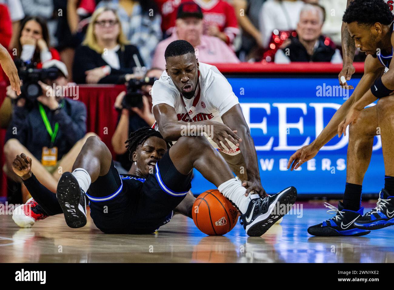 Raleigh, NC, USA. 04th Mar, 2024. Duke Blue Devils forward Mark Mitchell (25) and North Carolina ...