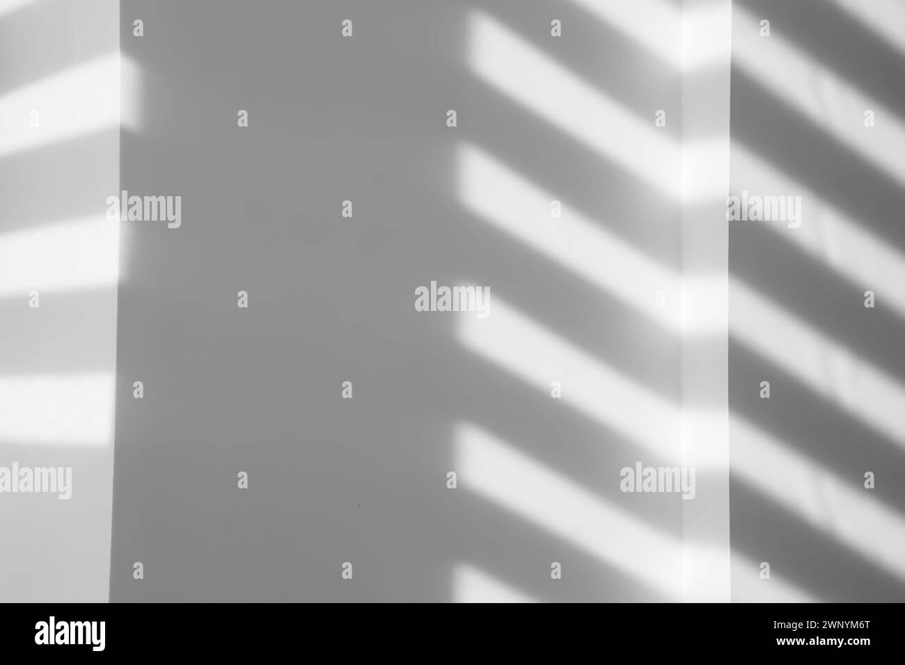 Light and shadows falling on white wall Stock Photo - Alamy