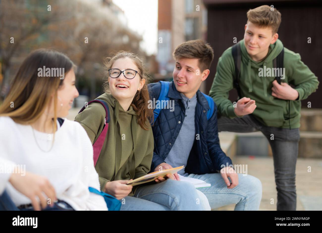 Group of positive teenagers having fun together Stock Photo - Alamy