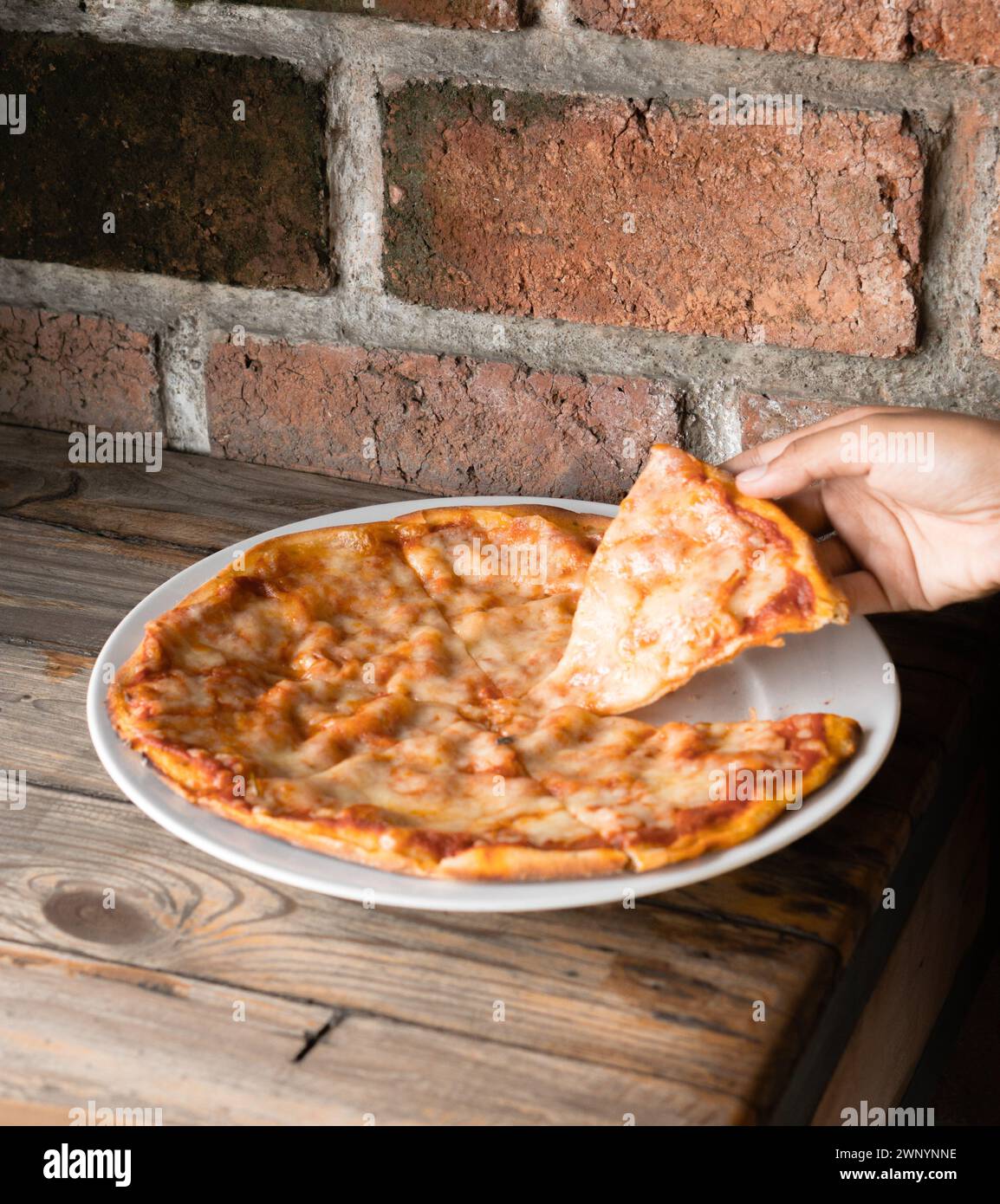 Taking out pizza hi-res stock photography and images - Alamy