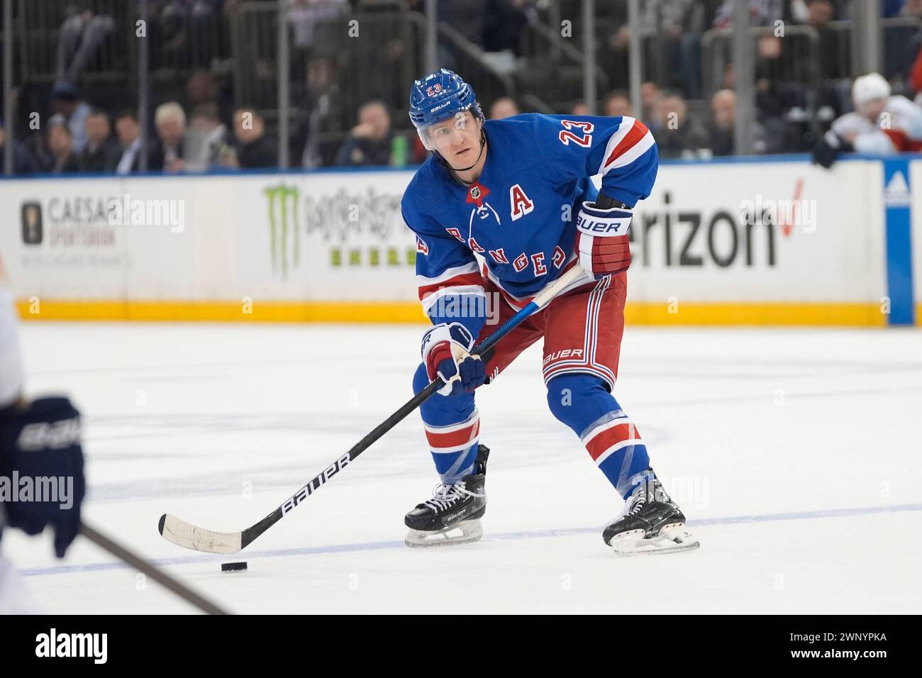 New York Rangers defenseman Adam Fox looks to pass during the second ...