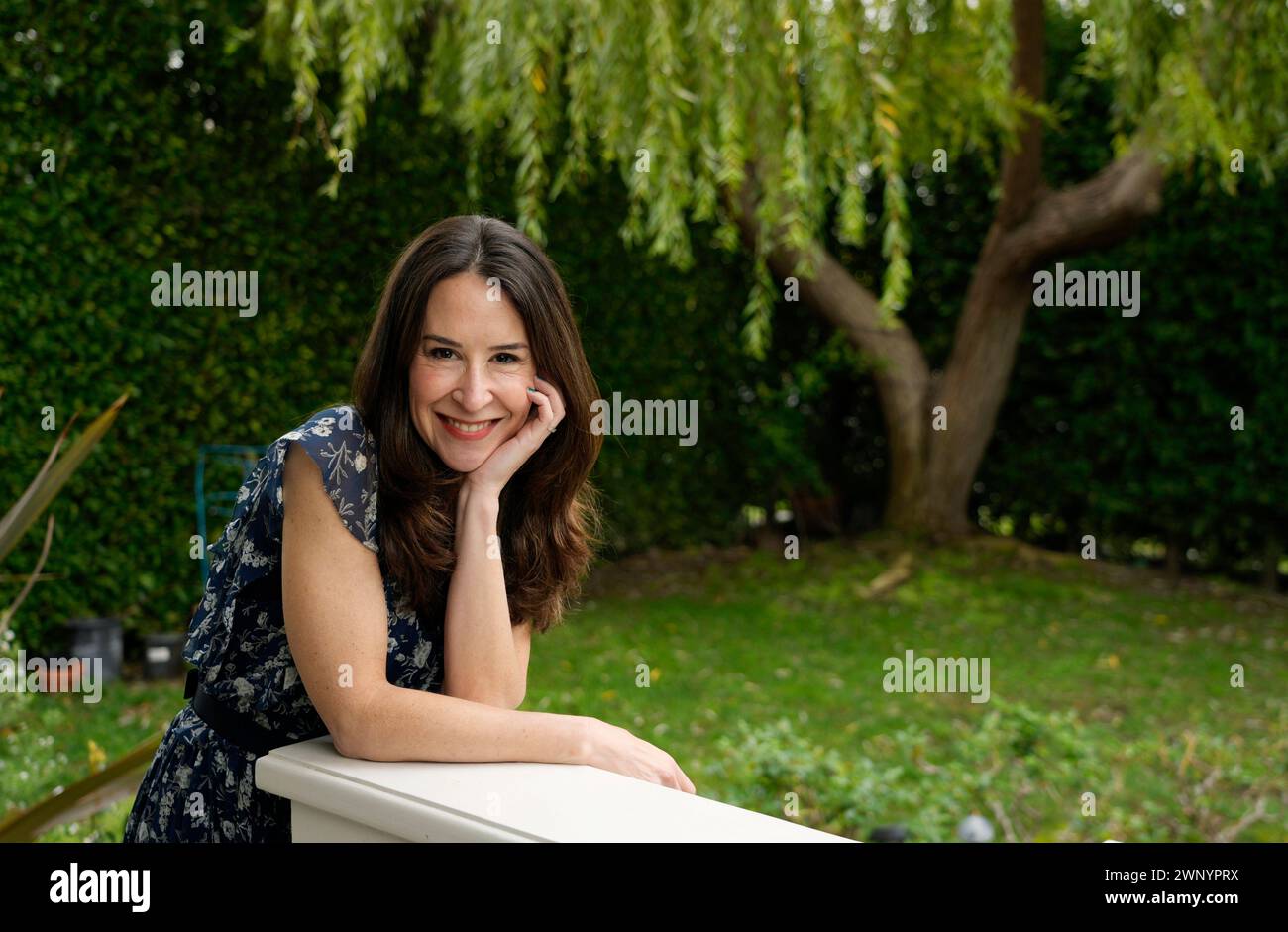 Author Allison Winn Scotch poses for a portrait in her home office ...