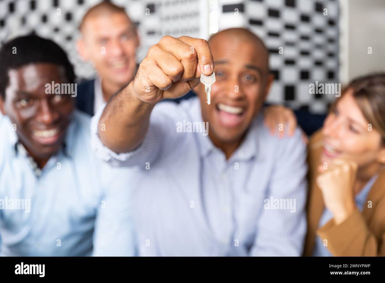 Colleagues playing in chess quest room during team building Stock Photo ...