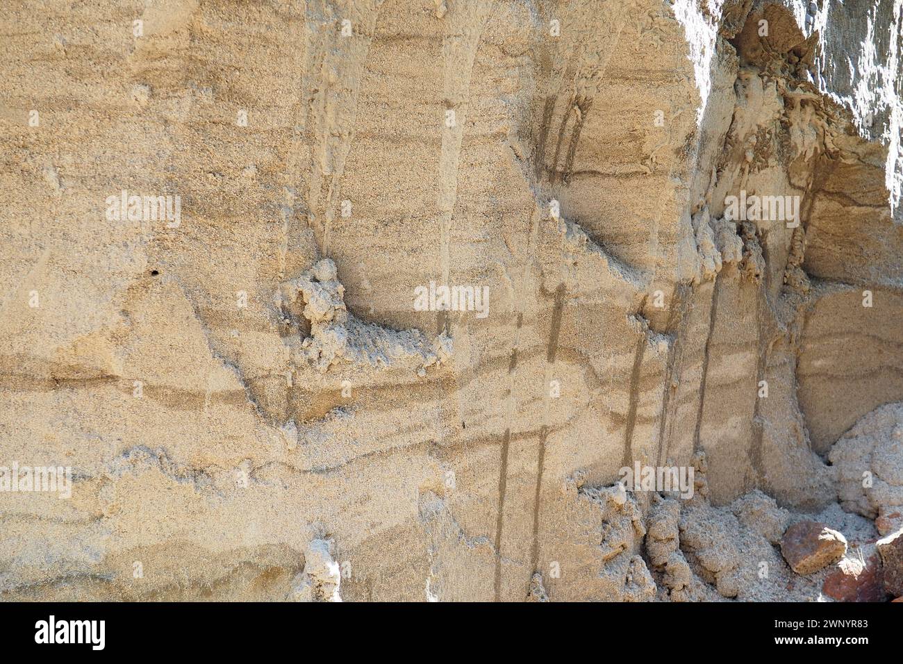 Sandstone is a fragmentary sedimentary rock, a homogeneous or layered ...