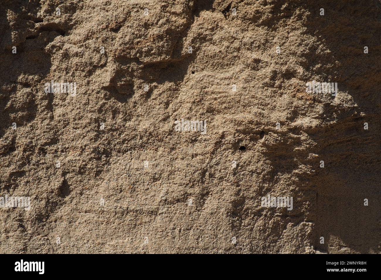 Sandstone is a fragmentary sedimentary rock, a homogeneous or layered ...