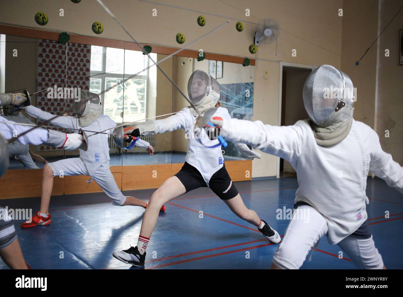 Odessa, Ukraine. 02nd Mar, 2024. Young sportsmen fencing athletes are ...