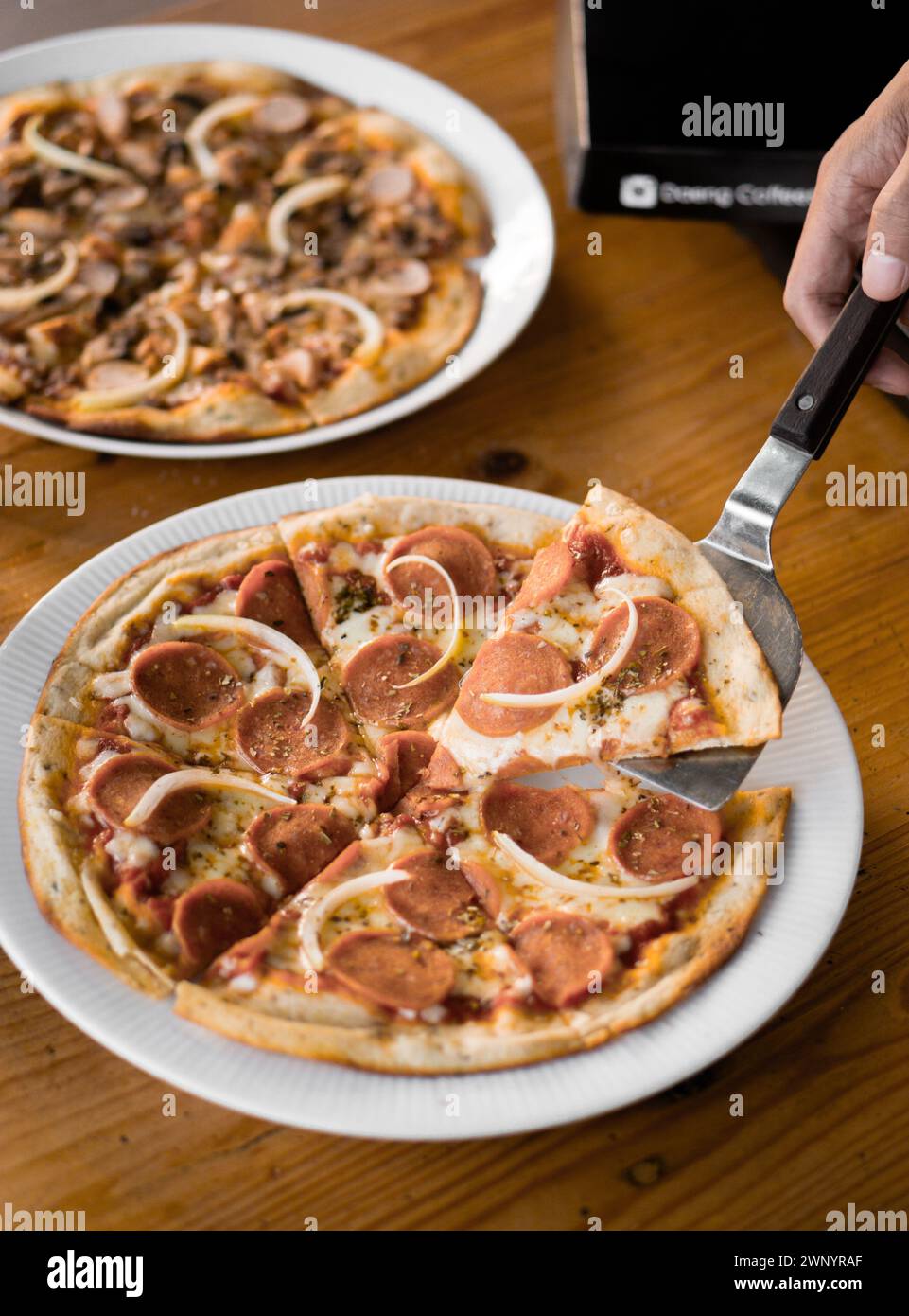 Two pizzas table hi-res stock photography and images - Alamy