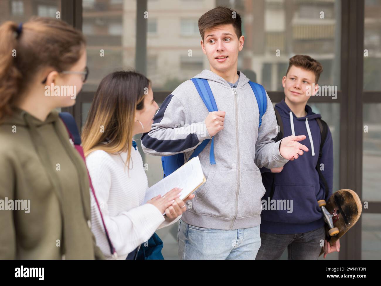 Teenage students talking outside after lessons Stock Photo - Alamy