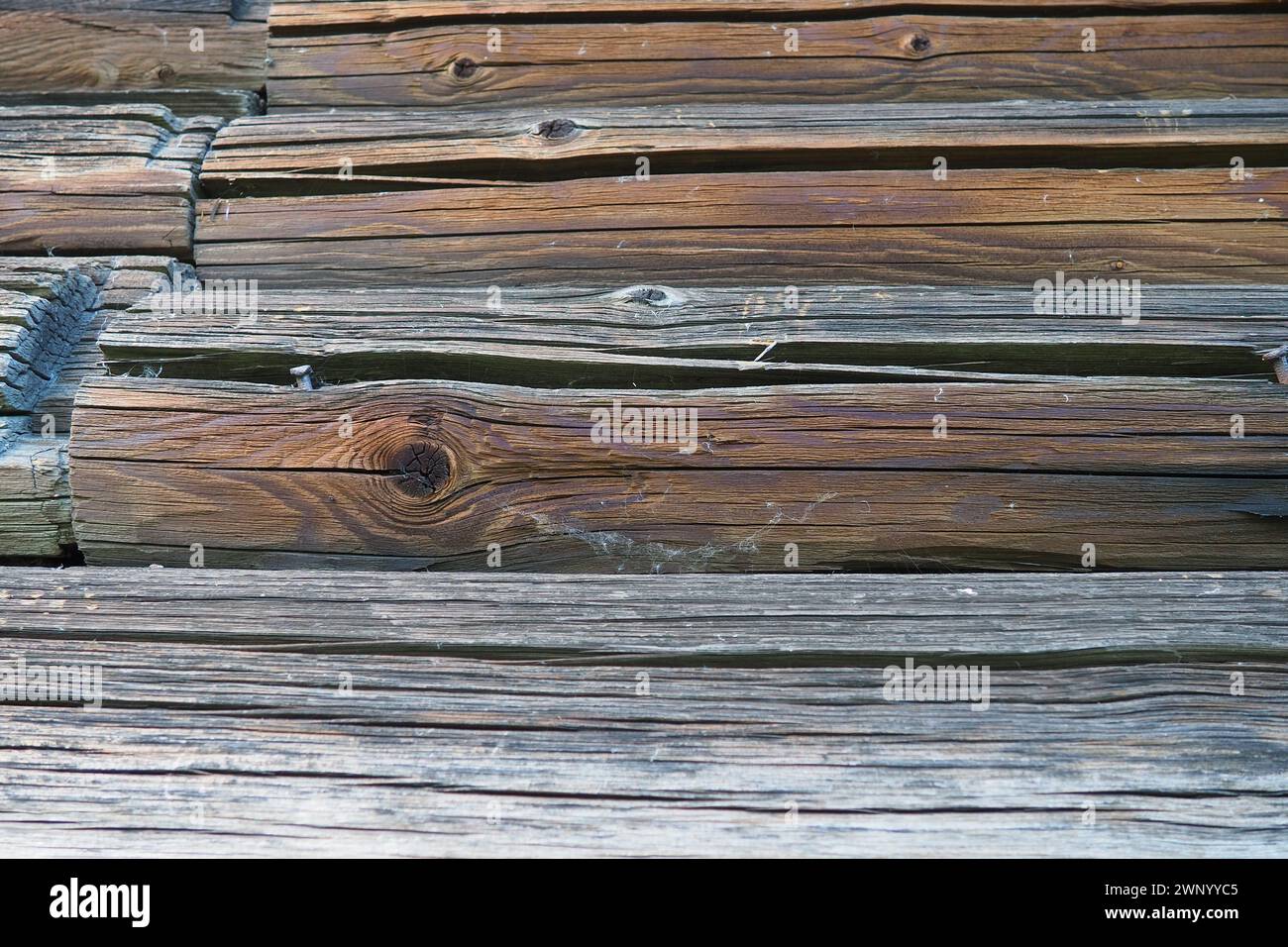 Background horizontal logs. Wooden background from shabby boards and ...