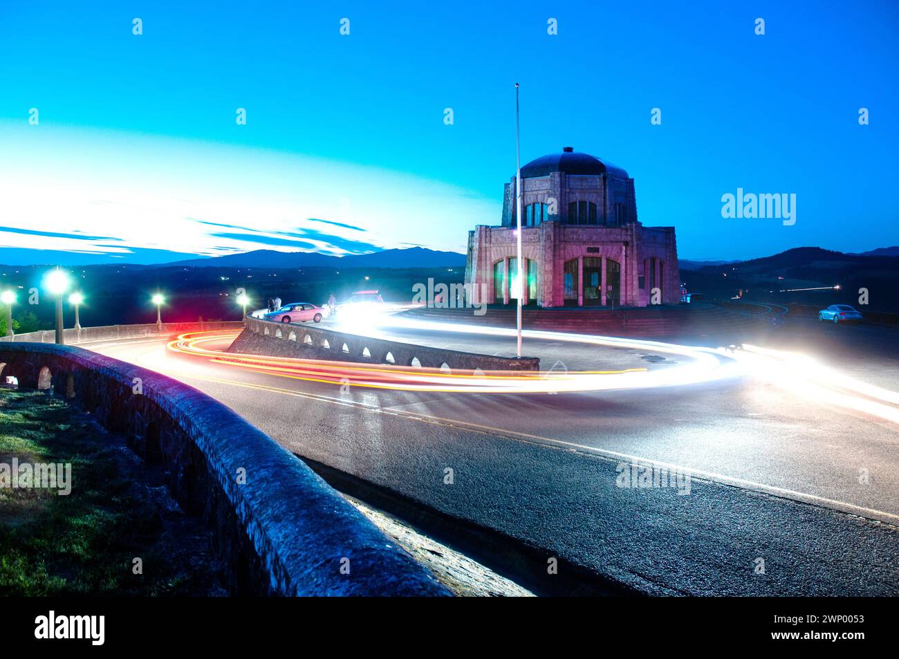 Nighttime traffic circles the Vista House at Crown Point overlooking ...