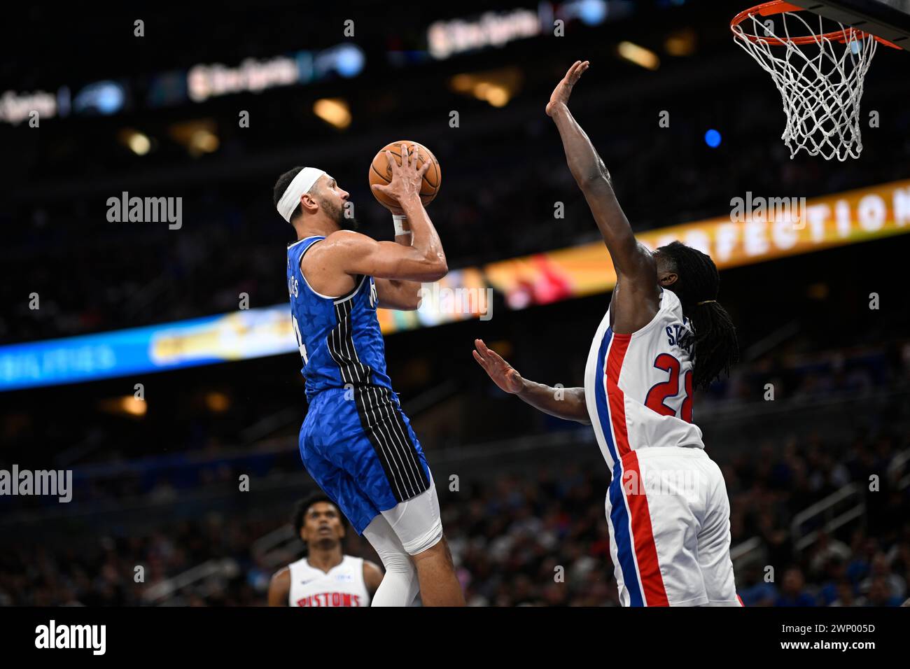 Orlando Magic guard Jalen Suggs (4) goes up for a shot in front of ...