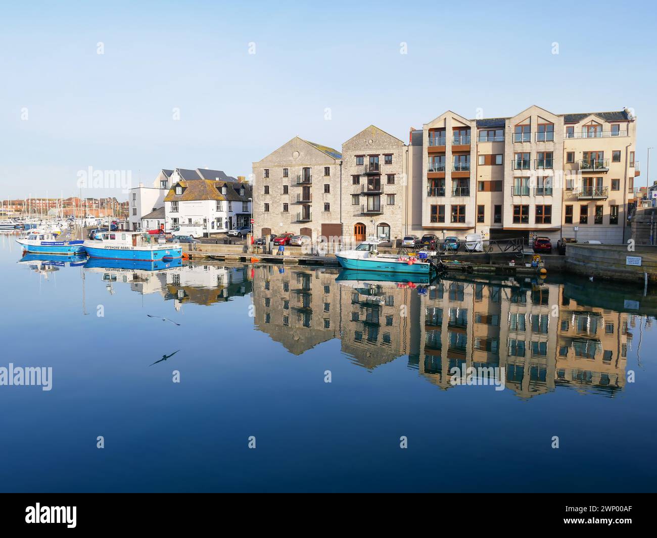 Fishing Boats on the river at Weymouth Harbour in Dorset, England with ...