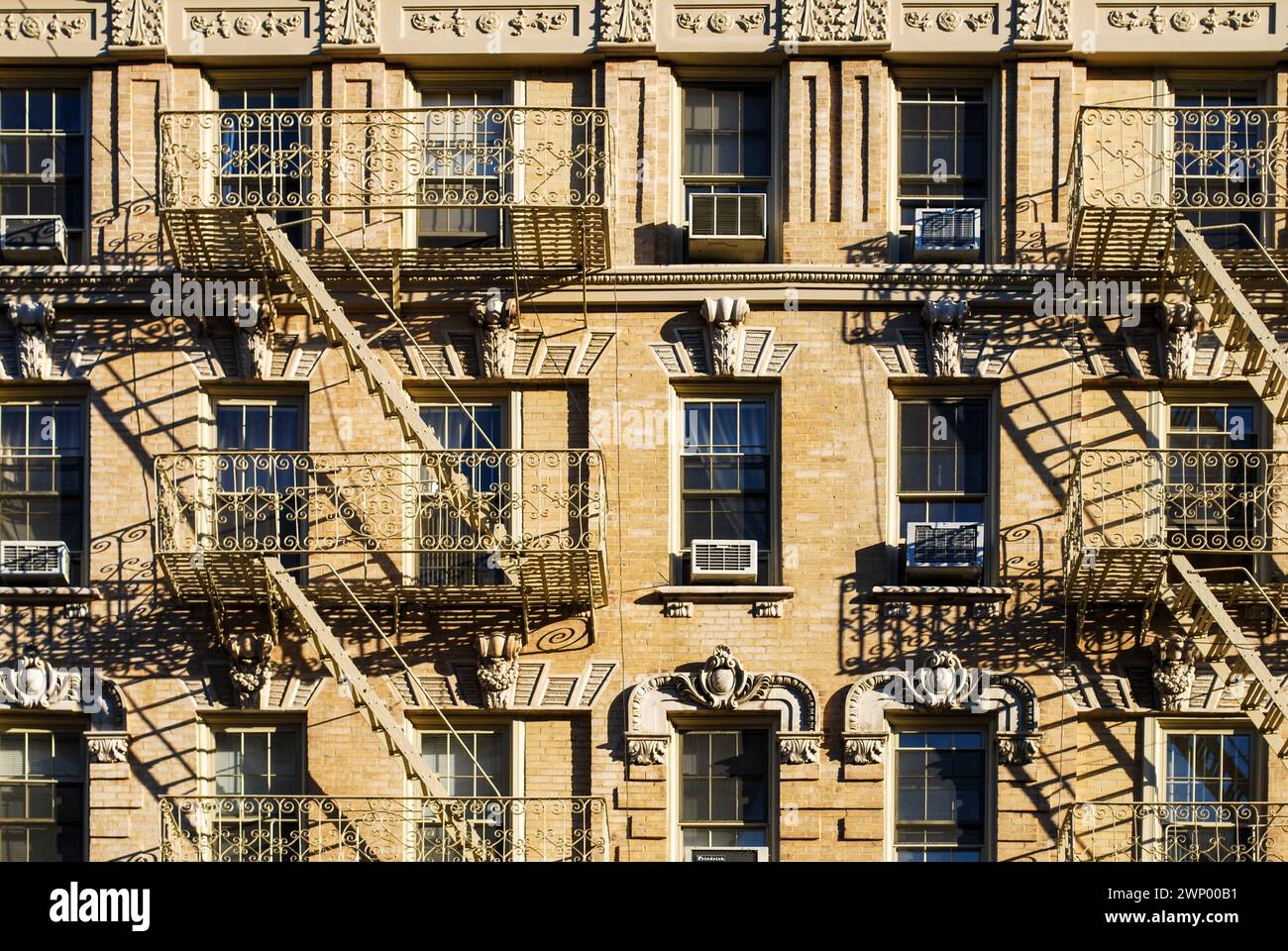 Detail of building with fire escapes Stock Photo - Alamy