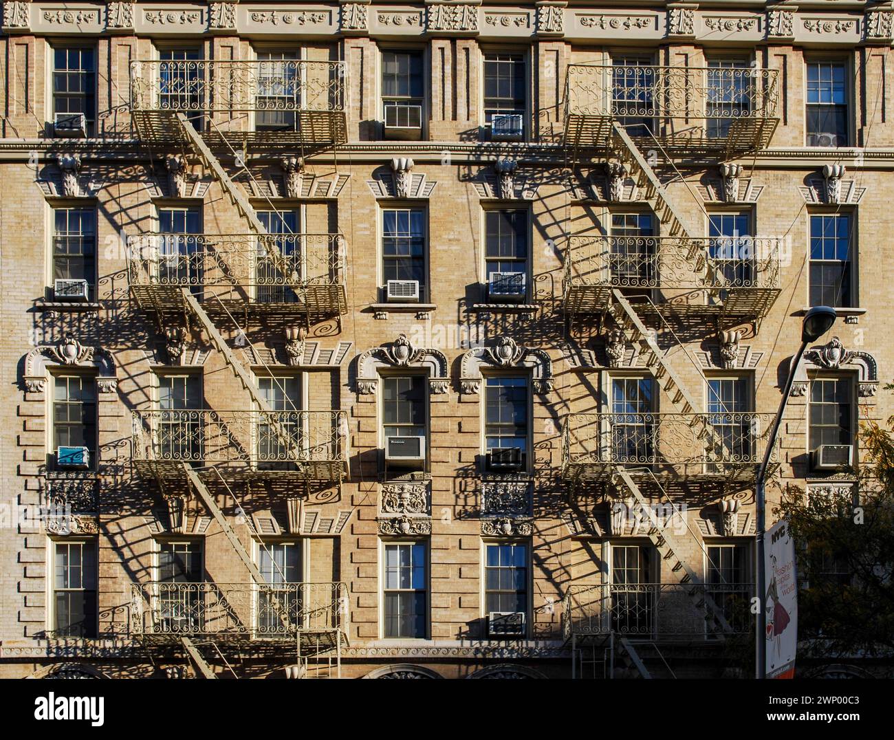 Detail of building with fire escapes Stock Photo - Alamy