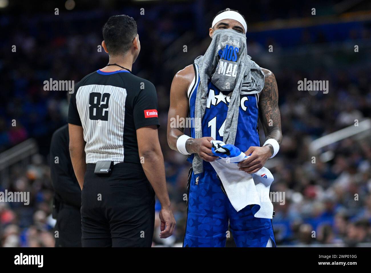 Orlando Magic guard Gary Harris (14) chats with official Suyash Mehta ...