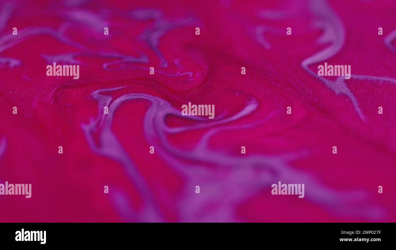 Glitter fluid sparkling ink mix neon pink paint Stock Photo - Alamy