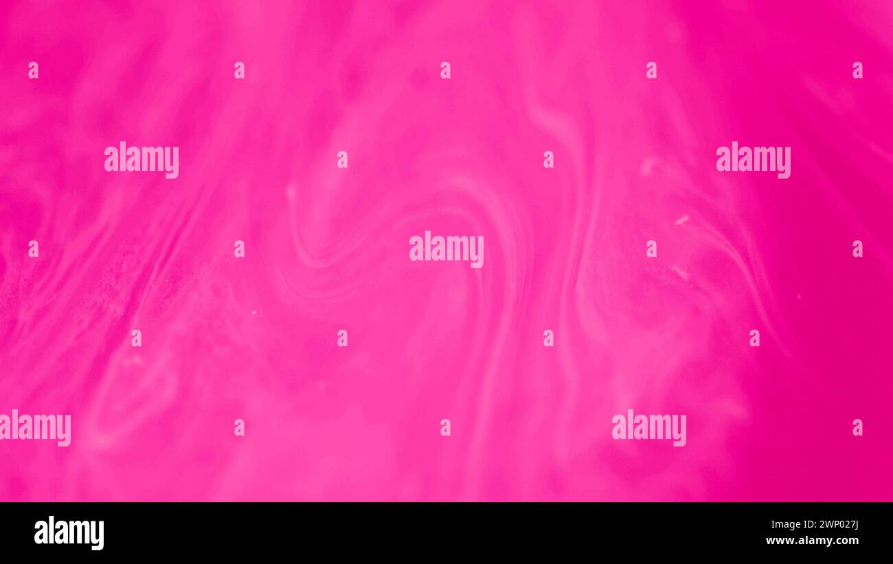 Pigment swirls paint mix water pink white ink wave Stock Photo - Alamy