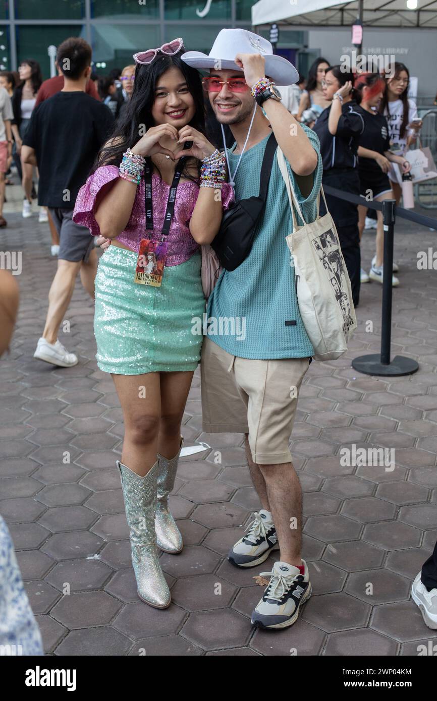 4th March 2024. A fanciful couple fans posing for picture. Taylor Swift ...