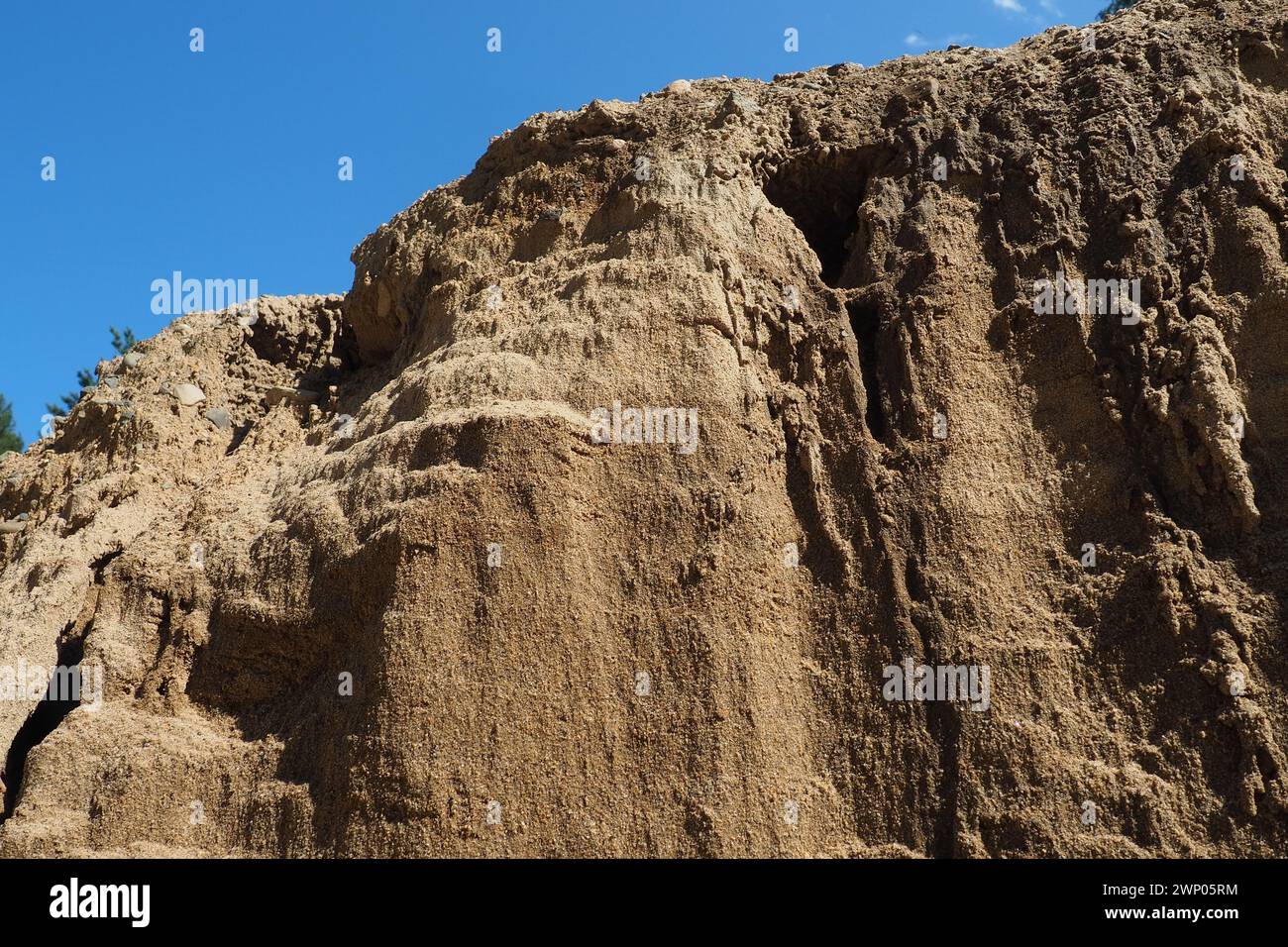 Sandstone is a fragmentary sedimentary rock, a homogeneous or layered ...