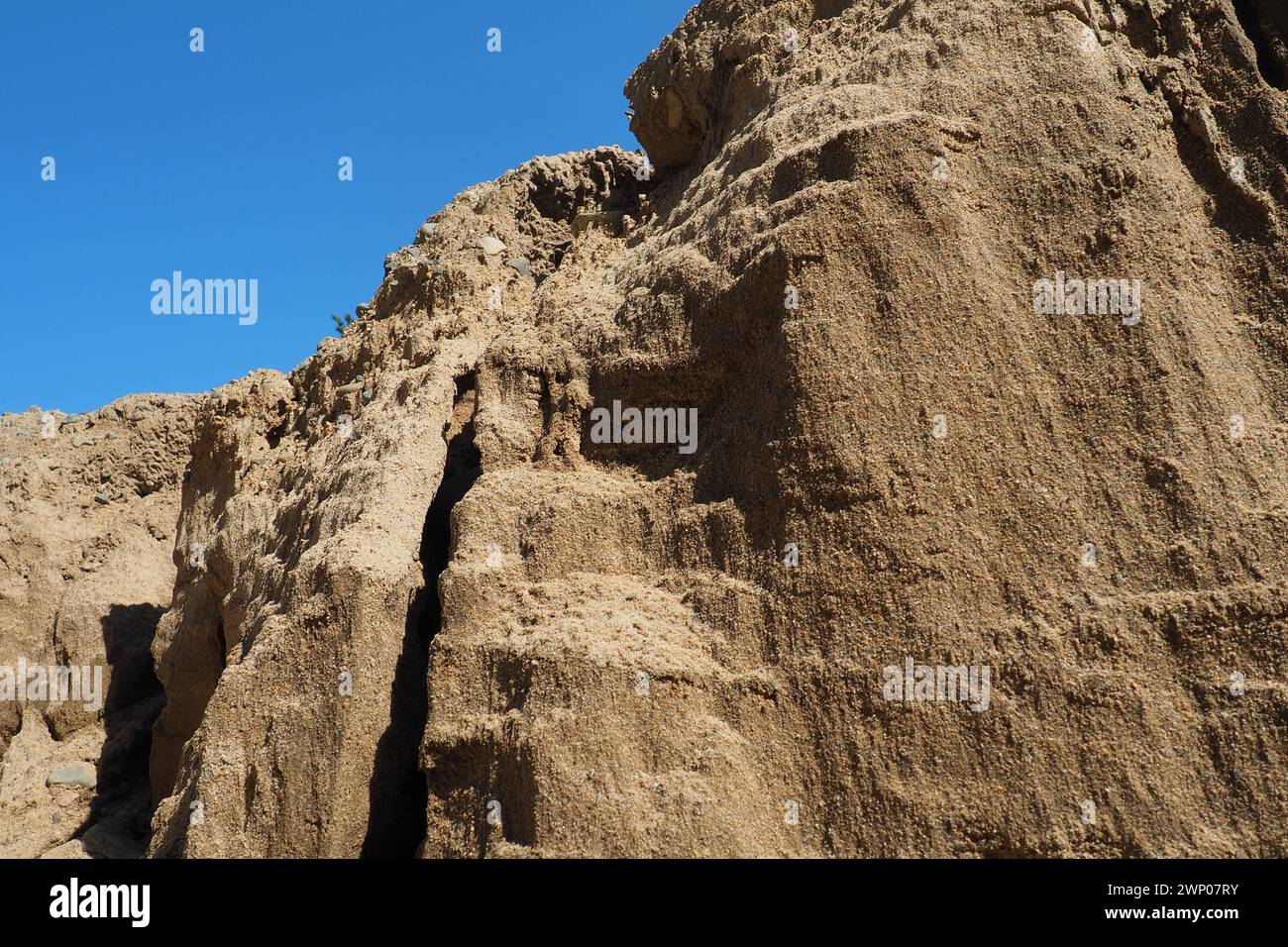 Sandstone is a fragmentary sedimentary rock, a homogeneous or layered ...