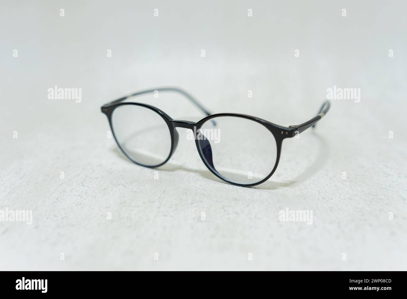 Front view of black glasses with a simple classic style isolated on a ...