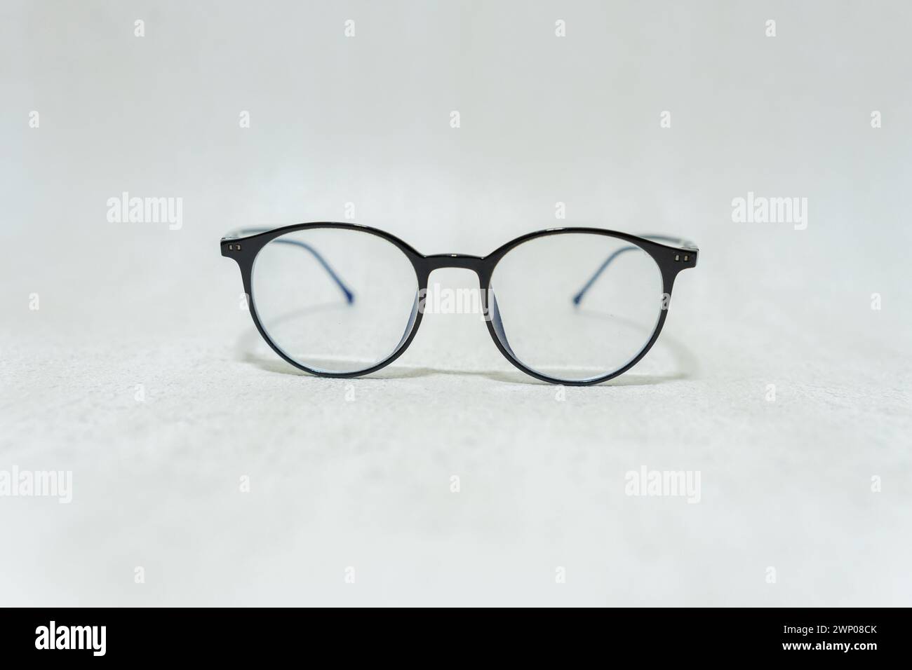 Front view of black glasses with a simple classic style isolated on a ...