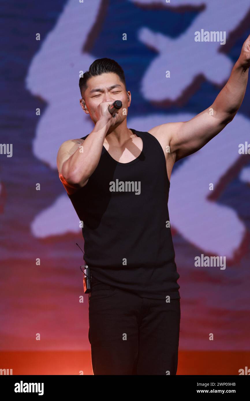 Korean American singer and actor Nicky Lee performs at a music festival ...