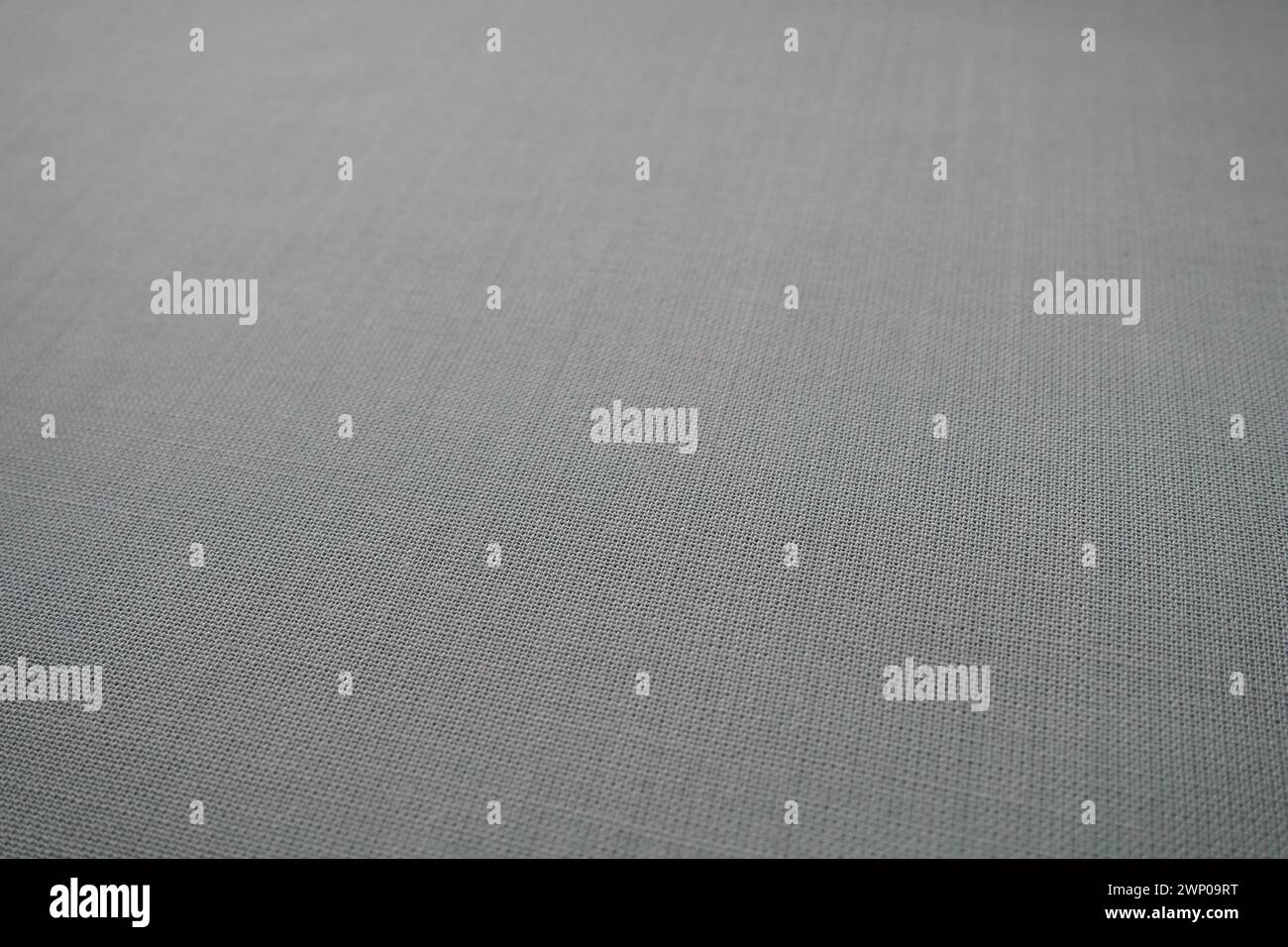 gray background fabric texture. A piece of woolen cloth is neatly laid ...