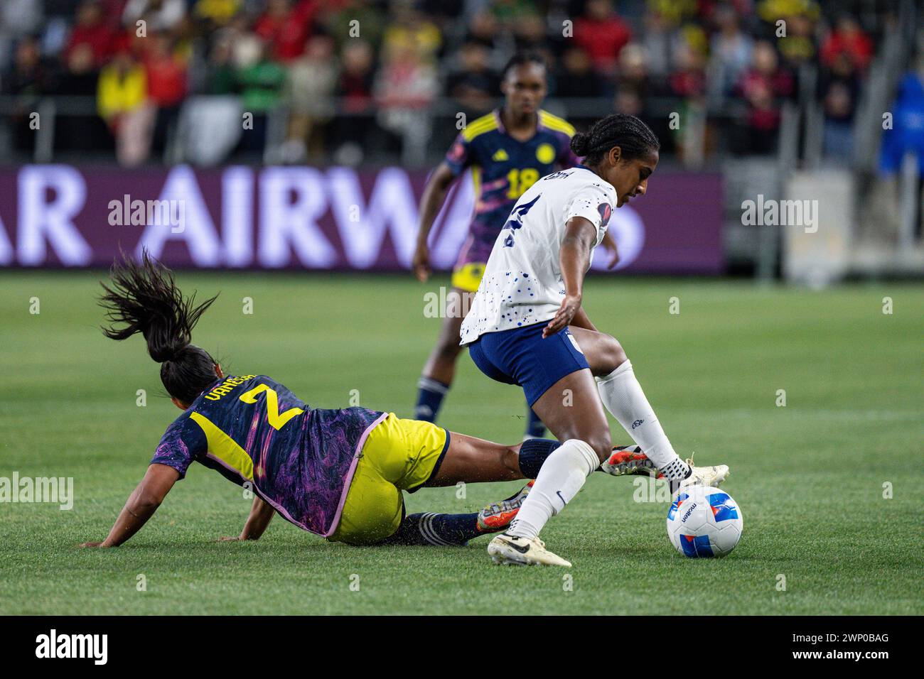 United States defender Naomi Girma (4) avoids a slide tackle by ...