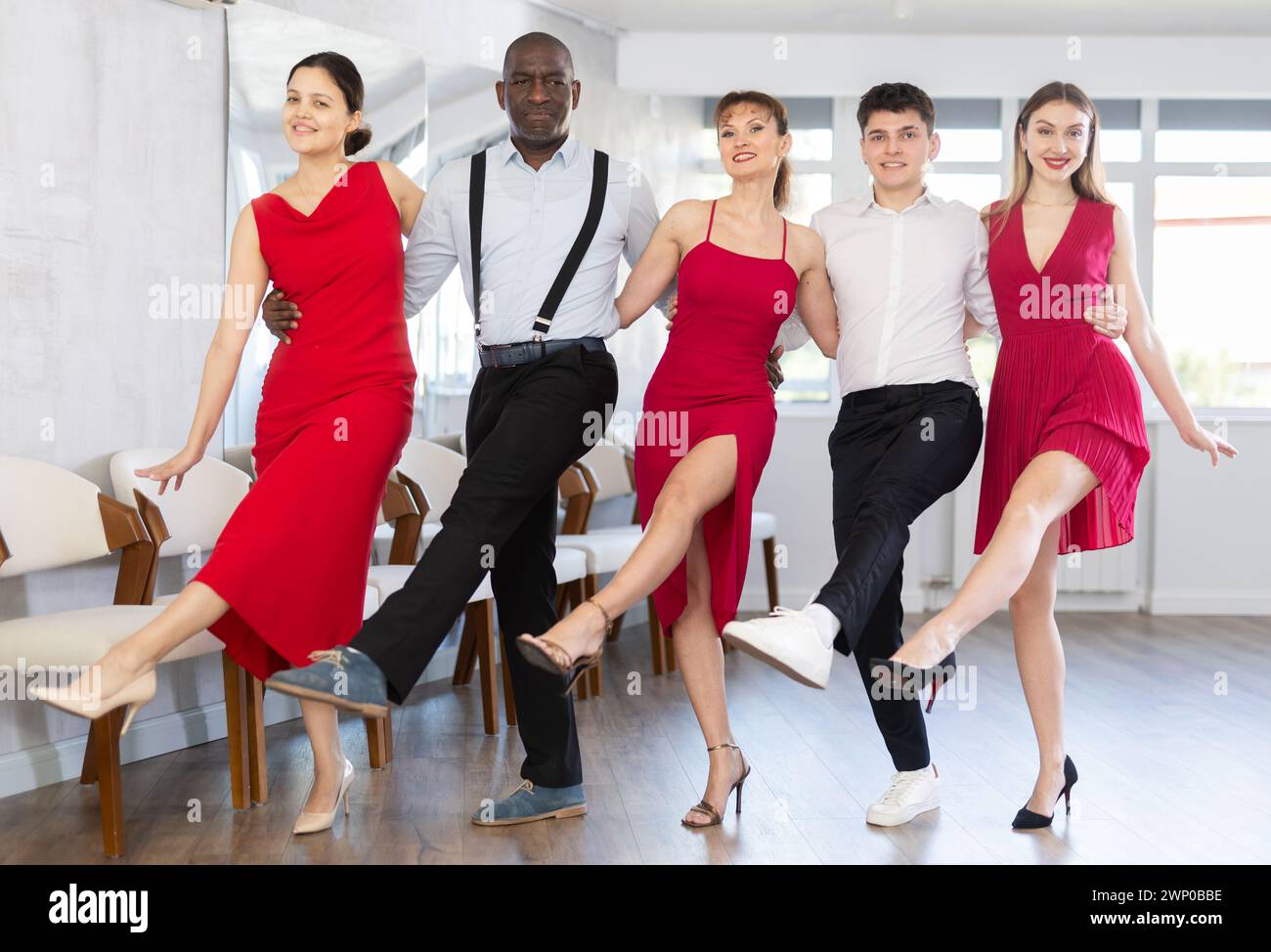 Group of multiethnic people dancing folk dance Stock Photo - Alamy
