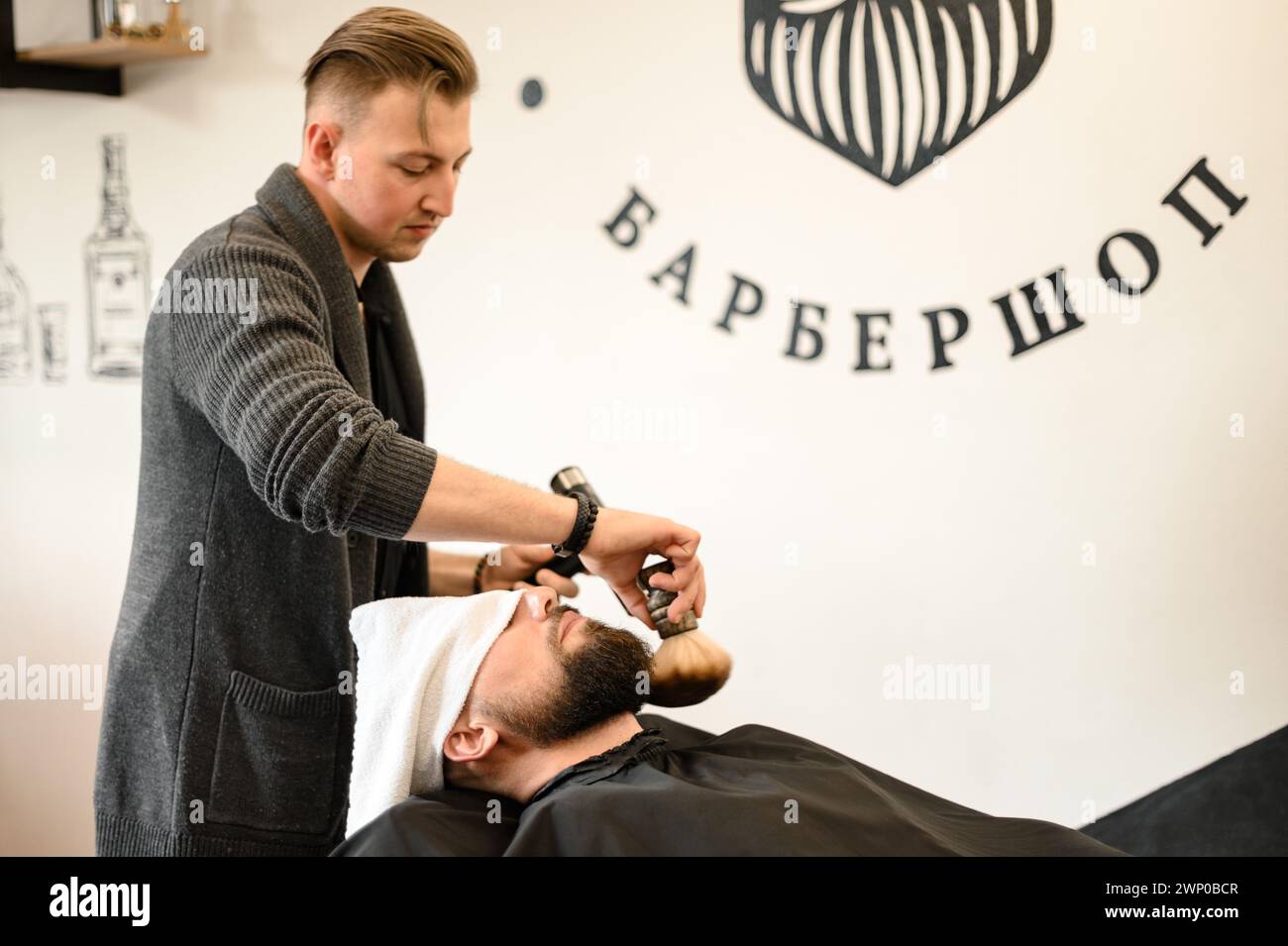 Barber sweeps hair brush hi-res stock photography and images - Alamy