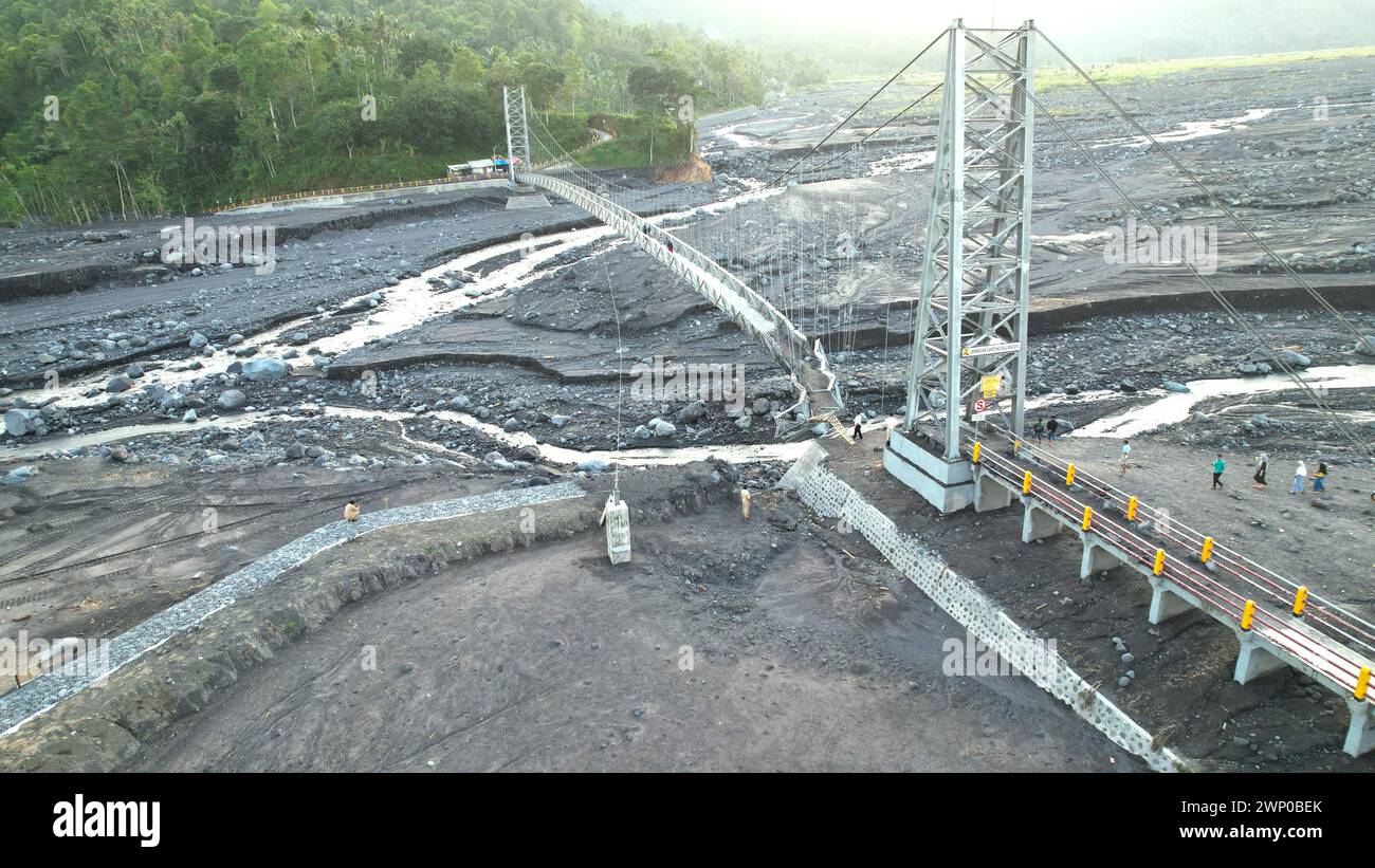 The suspension bridge that collapsed was hit by a flash flood. So it is ...