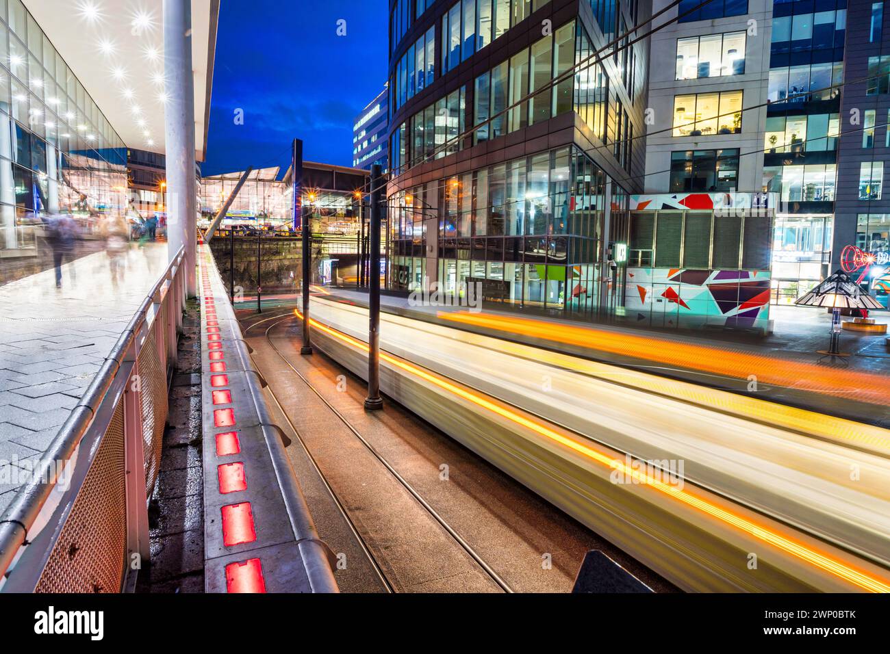 Long exposure photo of Manchester Piccadilly showing trams, cars and ...