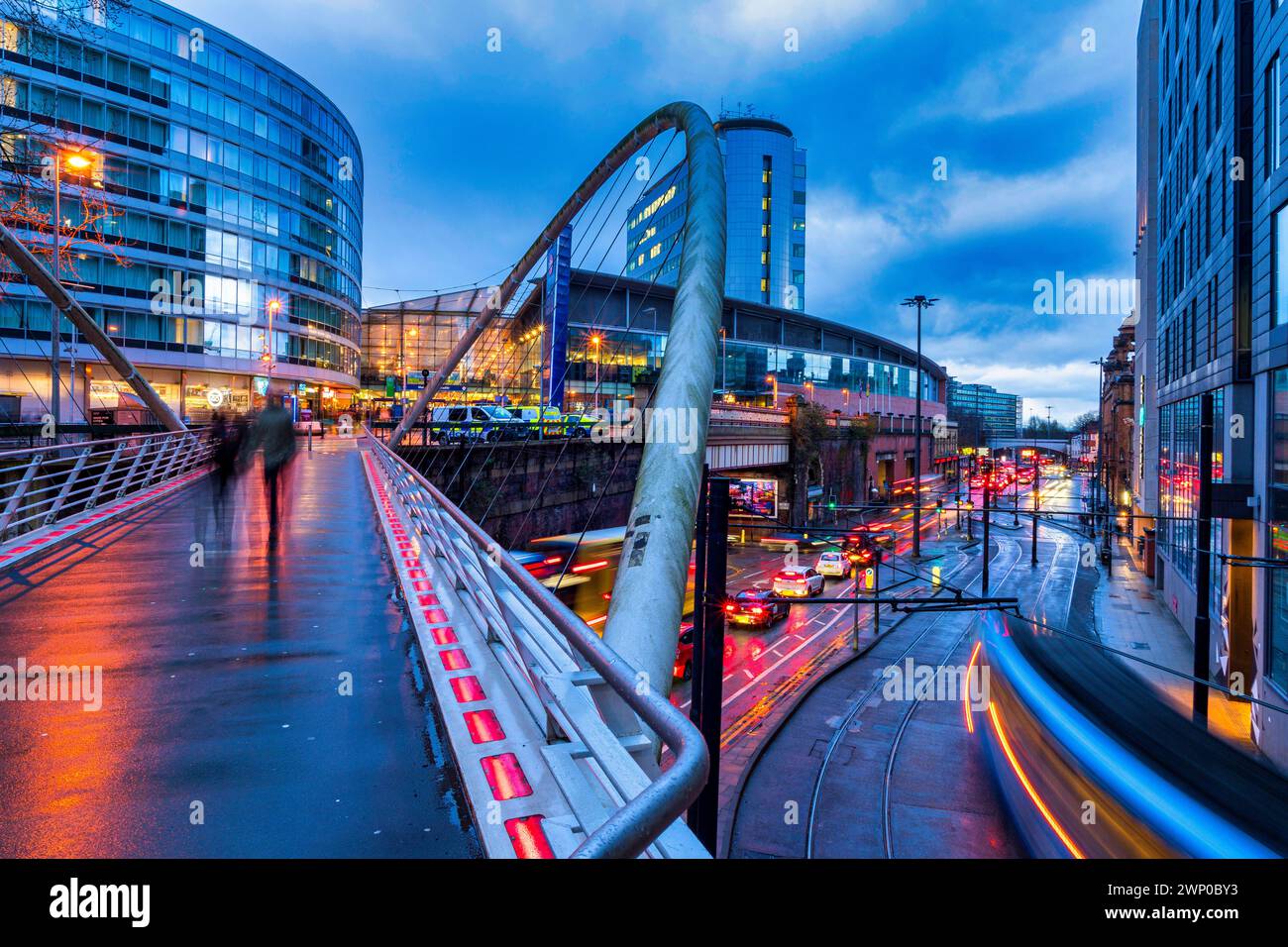 Long exposure photo of Manchester Piccadilly showing trams, cars and ...