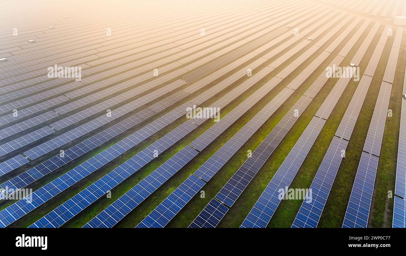 A picture showcasing a vast, contemporary photovoltaic solar farm Stock ...