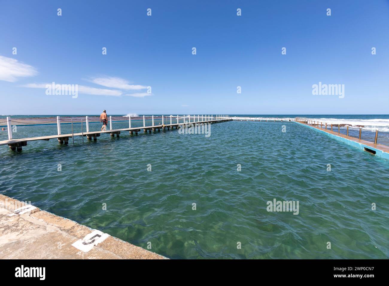 Narrabeen beach ocean pool rockpool on a blue sky autumn day in 2024 ...