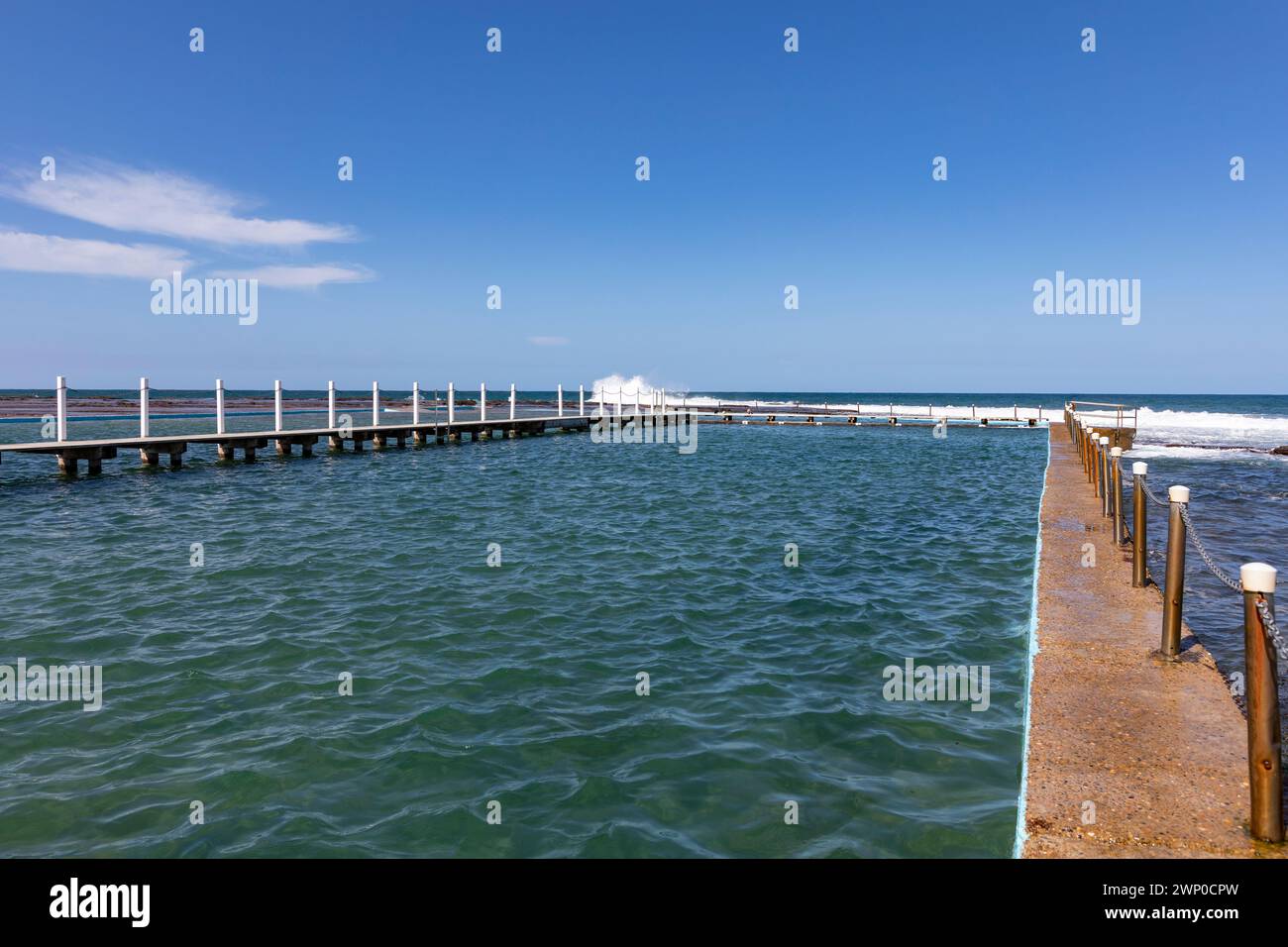 Narrabeen beach ocean pool rockpool on a blue sky autumn day in 2024 ...